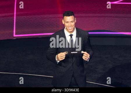 Aaron Judge assists during the 2026 FIFA World Cup draw at the John F ...