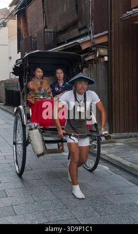 Japanese rickshaw on the street of Kyoto, Japan Stock Photo - Alamy