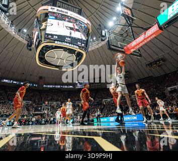 Purdue center Daniel Jacobsen (12) rebounds the ball against Wisconsin ...