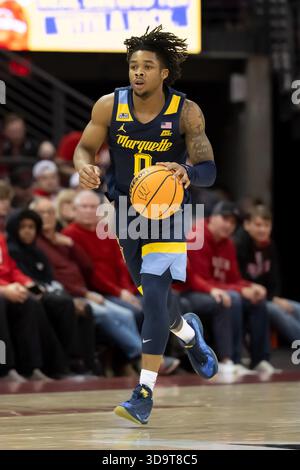 Marquette guard Nigel James Jr. (0) shoots the ball against Wisconsin ...