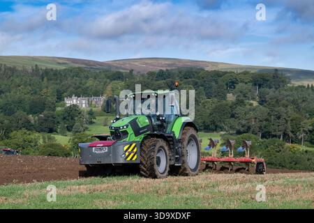 Farmer ploughing grassland in the Scottish Borders with a Deutz-Fahr ...