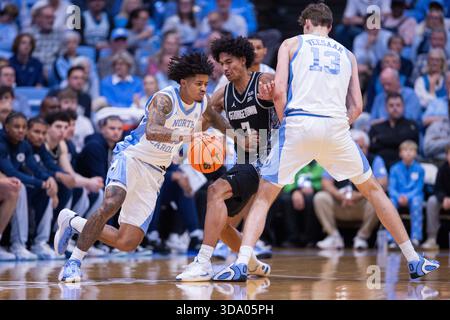 North Carolina forward Jonathan Powell (11) goes in for a dunk against ...