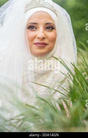 Beautiful Muslim bride outdoors Stock Photo - Alamy