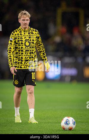 Julian Brandt of Borussia Dortmund warming up prior to the Tottenham ...