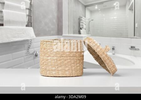 Bathroom Counter Organization with Woven Basket. Hairdryer, towel ...