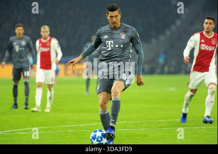 Robert Lewandowski of Bayern Munich scores a penalty making it 1-1 ...