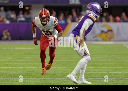 Washington Commanders wide receiver Treylon Burks (13) catching a pass ...