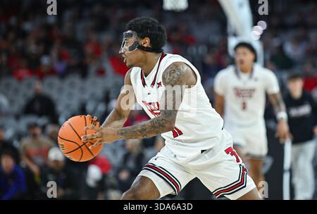Texas Tech guard Jaylen Petty (11) plays defense against Northern ...