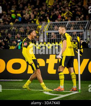 Felix Nmecha of Borussia Dortmund and Nico Schlotterbeck of Borussia ...