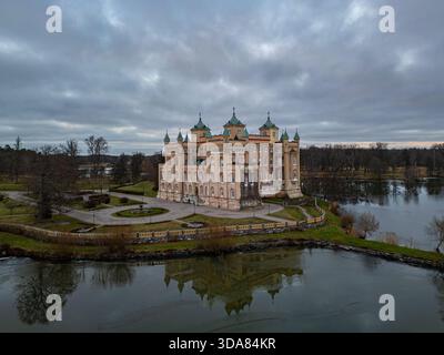 Aerial view of Stora Sundby mansion's ornate facade and lush grounds ...