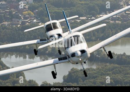 An air-to-air photograph of a Piper P28 aircraft, registration 00-VMY ...
