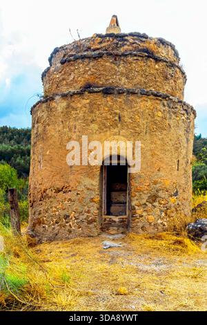 The medieval Arab circular watchtower (Torre Árabe) in the Fuente ...