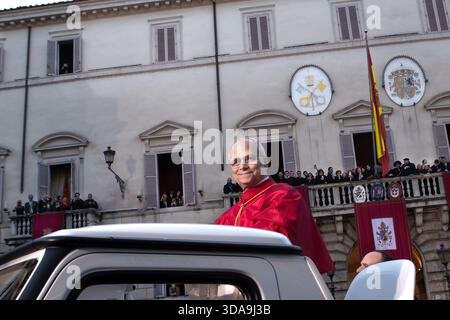 Pope Leo XIV waves as he leaves after his weekly general audience in St ...