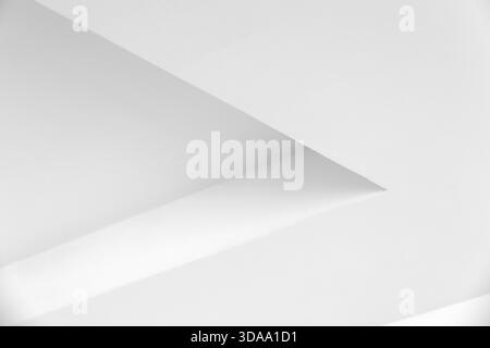 A grayscale abstract background featuring diagonal lines and a central ...