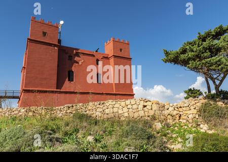 The red tower in Malta or St Agatha’s Tower. Blue sky on sunny day, no ...