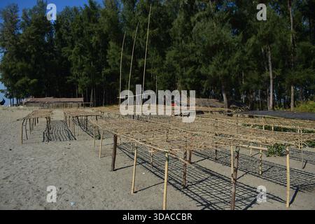 Traditional Dried Fish Making Rack under Sunlight Stock Photo - Alamy