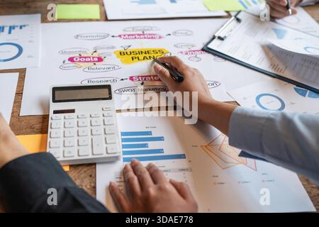 Group of Businesswoman and Accountant checking data document on digital ...