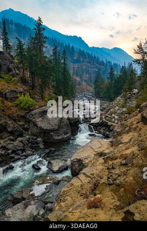 A mountain river flows through rocks in South America Stock Photo - Alamy