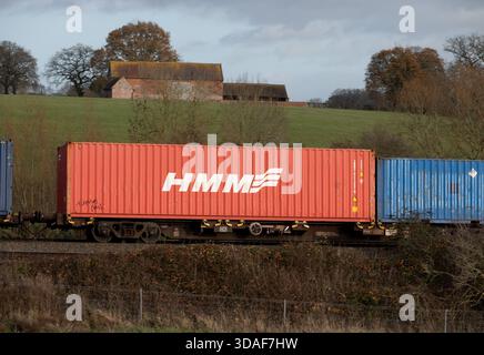 HMM shipping container on a freightliner train, Warwickshire, UK Stock ...