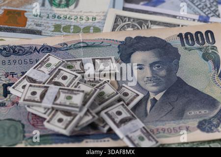 Miniature Dollars Stacks on Japanese Yen Note Stock Photo - Alamy