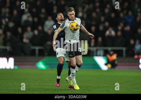 Callum Elder of Derby County controls the ball during the Sky Bet ...