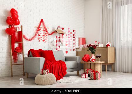 Gift boxes, rose flowers and cube calendar with date 14 FEBRUARY on ...