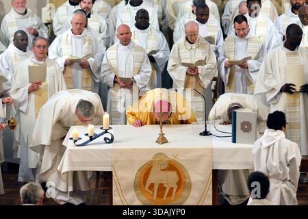 Saint Maurtice church. Holy Thursday. Chrism Mass. The priests of the ...