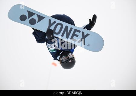 Rise Kudo of Japan competes during run 1 of the women's snowboard ...
