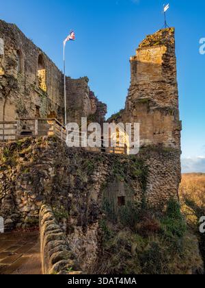 The crumbling stone walls and ruins of the ancient desert city of ...