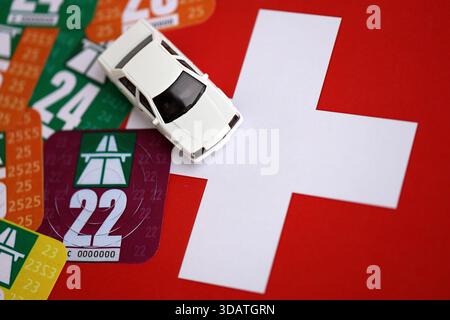 Switzerland vignette stickers for different years with toy car on Swiss ...