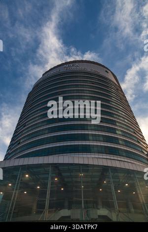 View of the modern Arfa Kareem Tower rises against a dynamic sky, its ...