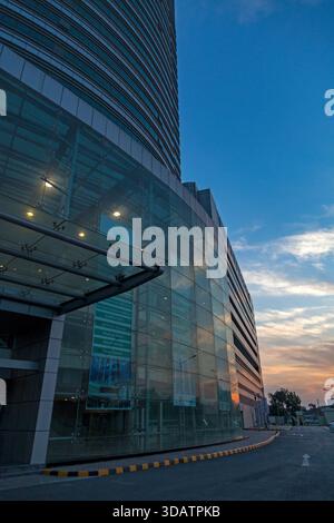 View of the modern Arfa Kareem Tower rises against a dynamic sky, its ...