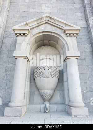 stone sculpture of a decorated vase Stock Photo - Alamy