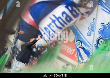 SYMBOL - 12 December 2025, Berlin: An excavator works on a construction ...