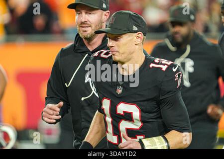 Atlanta Falcons quarterback Easton Stick (12) warms up before an NFL ...
