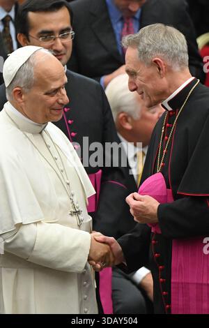 Pope Leo XIV greets Italian Prime Minister Giorgia Meloni at the end of ...