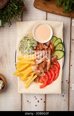 Chicken Shawarma or Doner Kebab in bread sandwich Stock Photo - Alamy