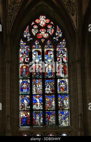Colorful leaded glass windows in the late medieval Bern Minster ...