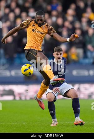 Mihailo Ivanović of Millwall battles for the ball in the air during the ...