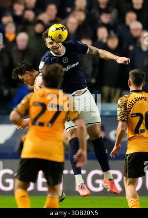 Jake Cooper of Millwall heads the ball over the cross bar during the ...