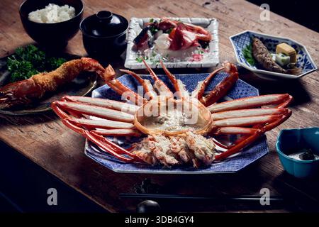 Japanese tableau - spider crab, miso soup, fish, prawns, sashimi Stock ...