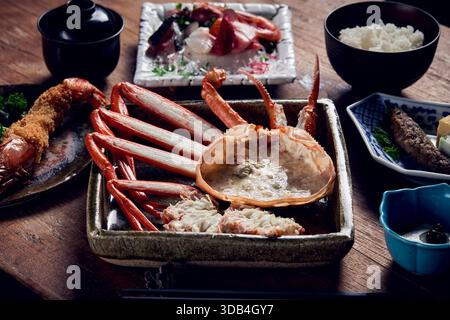 Japanese tableau - spider crab, miso soup, fish, prawns, sashimi Stock ...