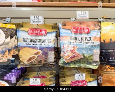 Ready to eat food packages on shelves at CU Convenience Store in Kuala ...