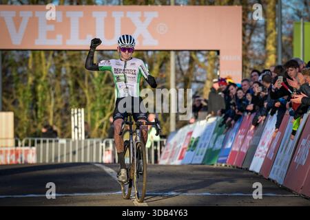 Belgian Mats Becque celebrates as he crosses the finish line to win the ...
