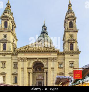 A vertical low angle shot of a building with an ancient exterior design ...