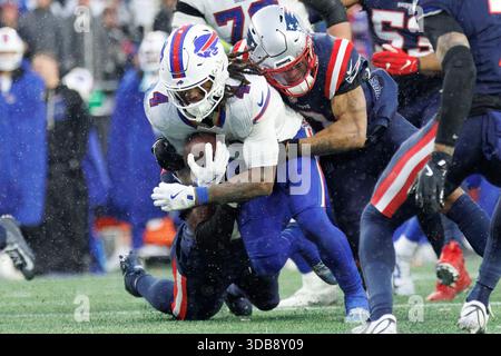 Buffalo Bills' James Cook III runs against the New England Patriots ...