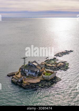 Island home. Solitary island house. Getaway house on rocky island ...