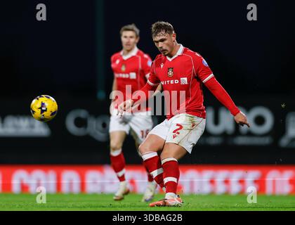 Callum Doyle of Wrexham passes the ball during the Sky Bet Championship ...