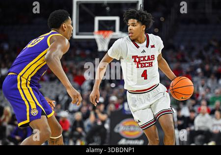 Texas Tech guard Christian Anderson (4) brings the ball up court ...