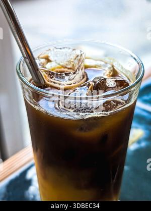 Black coffee with orange juice and iced mocha on wooden table, stock ...